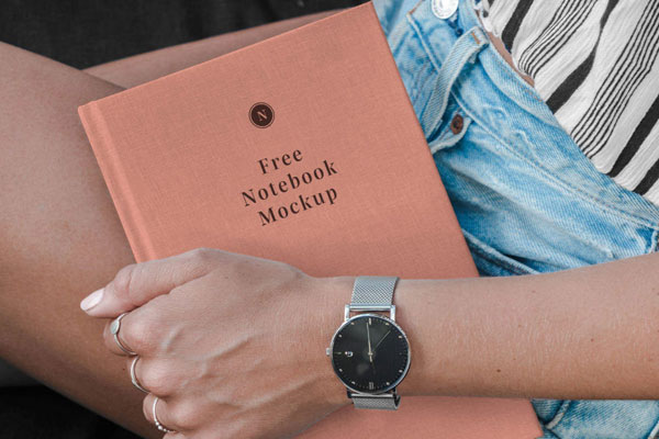 Mockup Showcasing a Girl Holding Hardcover Notebook Free Download ...
