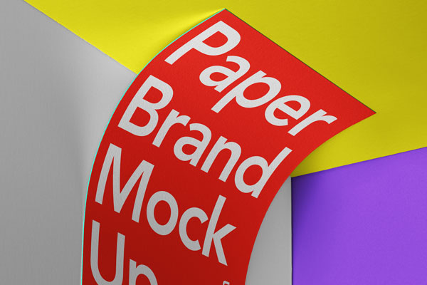 Partially Rolled Letter Paper Against Wall Mockup (FREE) - Resource Boy