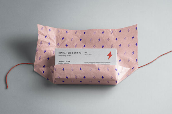 Mockup Displaying a Sack of Invitation Cards Partially Wrapped in a ...