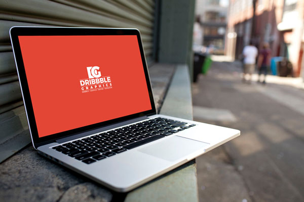 Mockup of a Perspective View Laptop in Street Free Download | Resource Boy