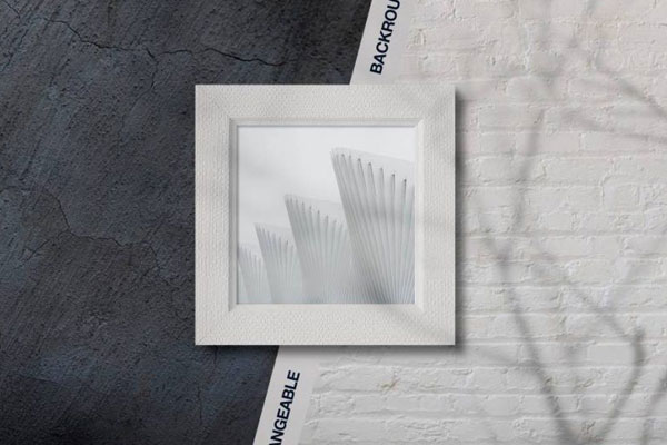 Overhead View of Square Picture Frame on Wall Background Mockup Free ...