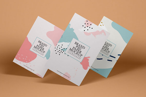 Mockup of Three Papers Standing at an Angle in Front View Free Download ...