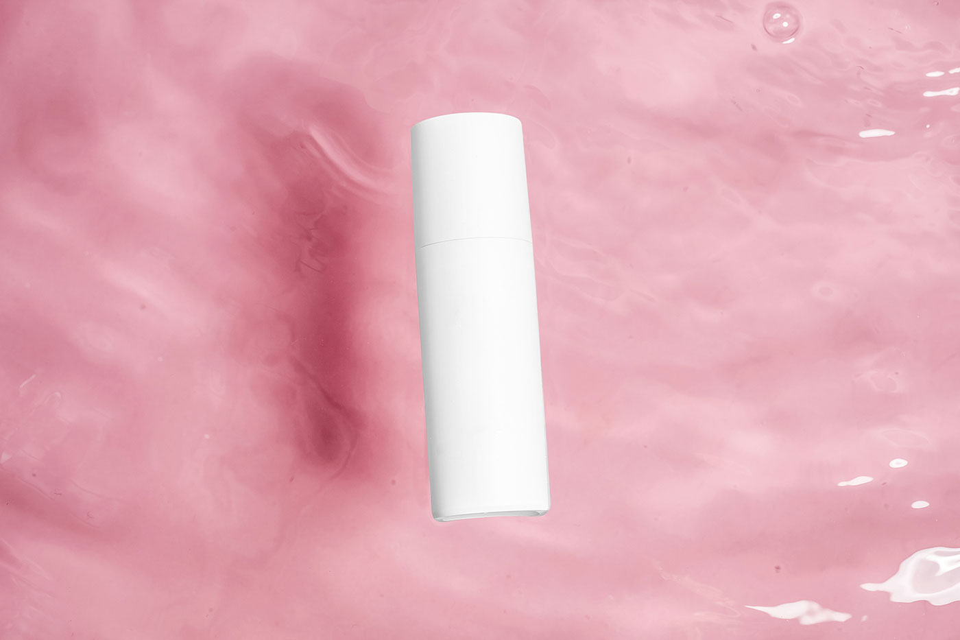 Cosmetic Bottle Floating in Water Mockup Free Download | Resource Boy